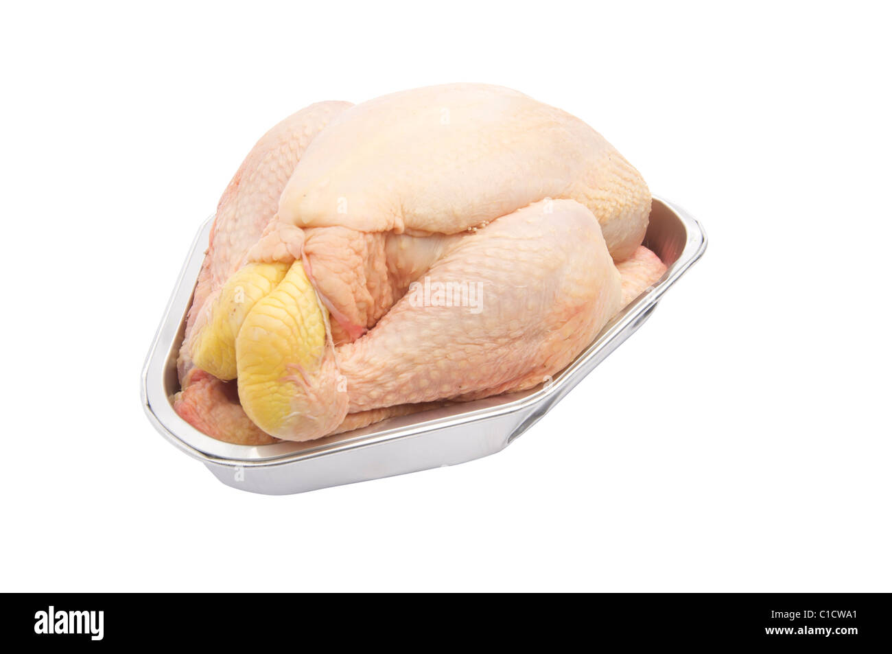 Raw Chicken ready for cooking in a metal tray, on a white background ...