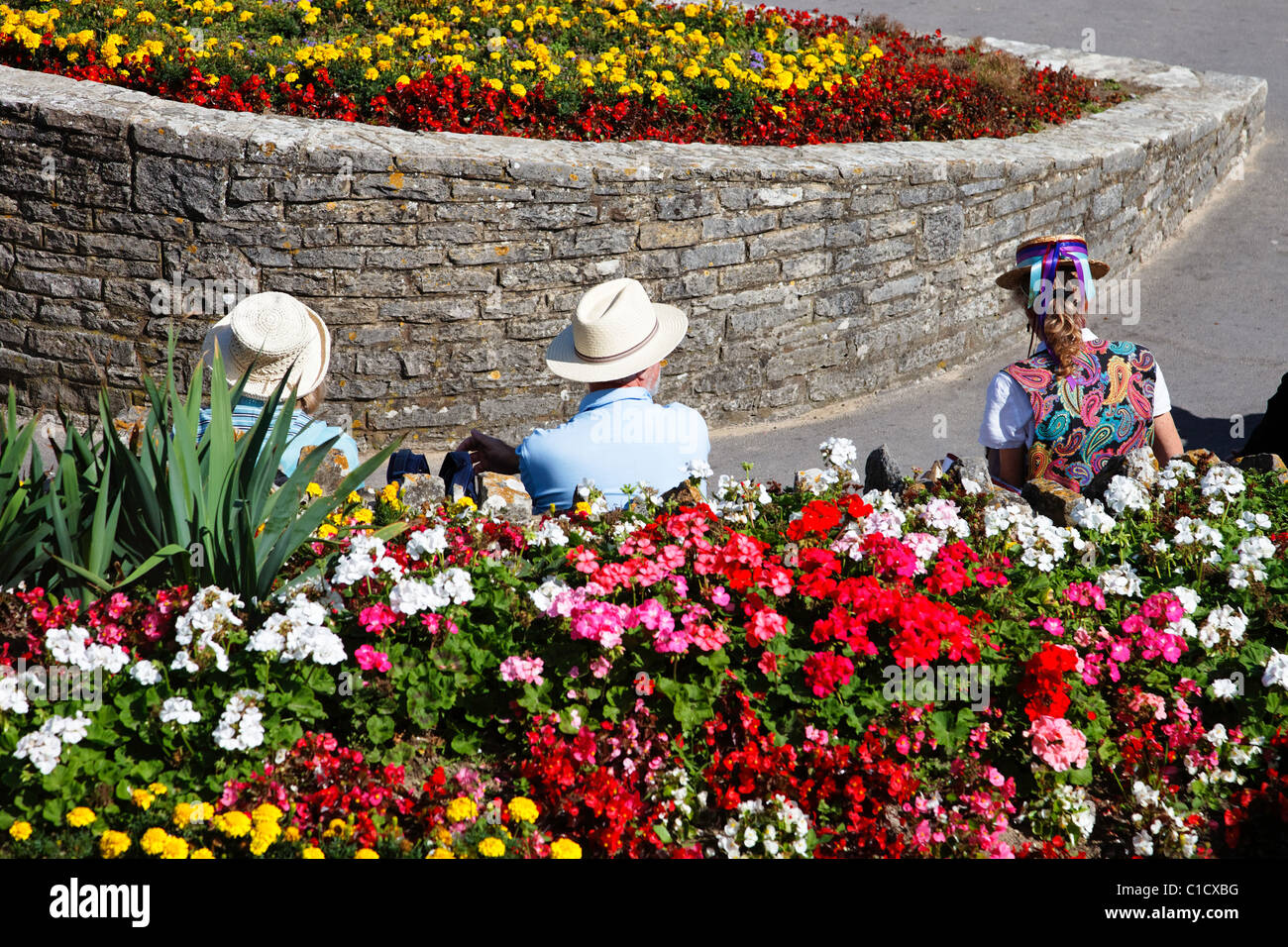 Morris Dancer Woman in Colourful Rag Jacket Sitting with Elderly Couple ...