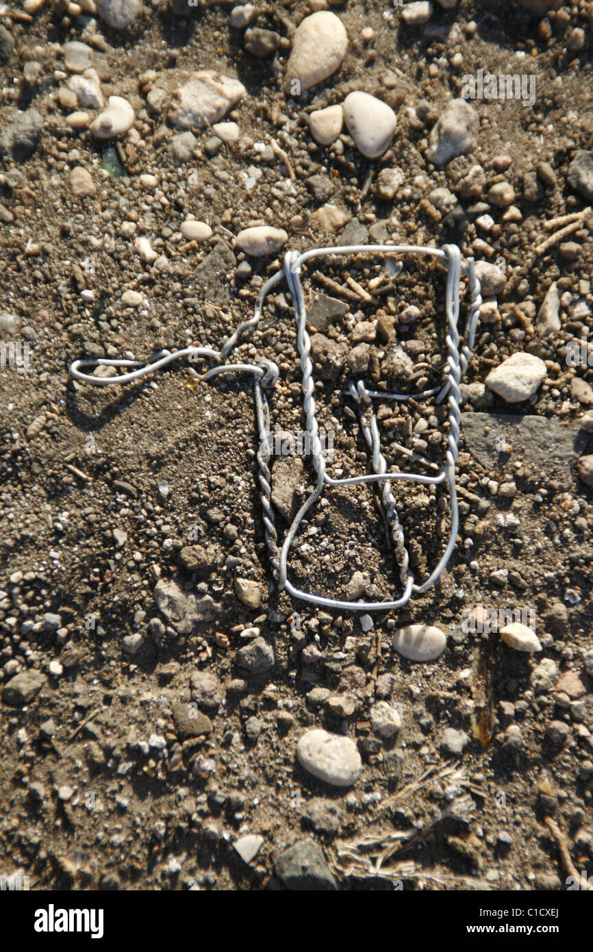champagne bottle top wire on floor ground Stock Photo - Alamy