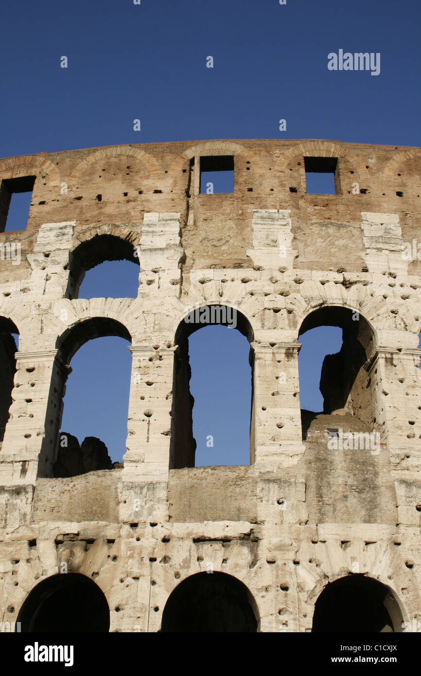 the colosseum amphitheatre wall facade, rome Stock Photo - Alamy
