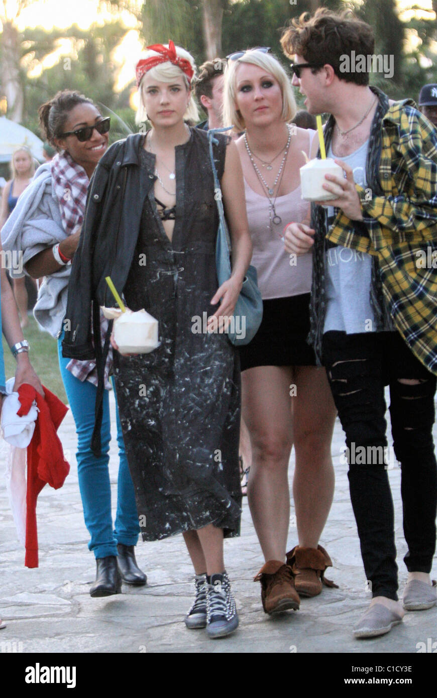 Remi Nicole, Agyness Deyn and friends carry coconut drinks while ...