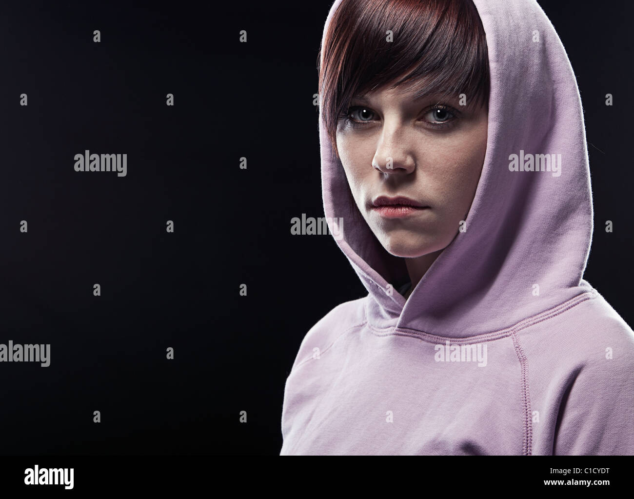 Shot of a Hooded Teenage Girl Stock Photo - Alamy