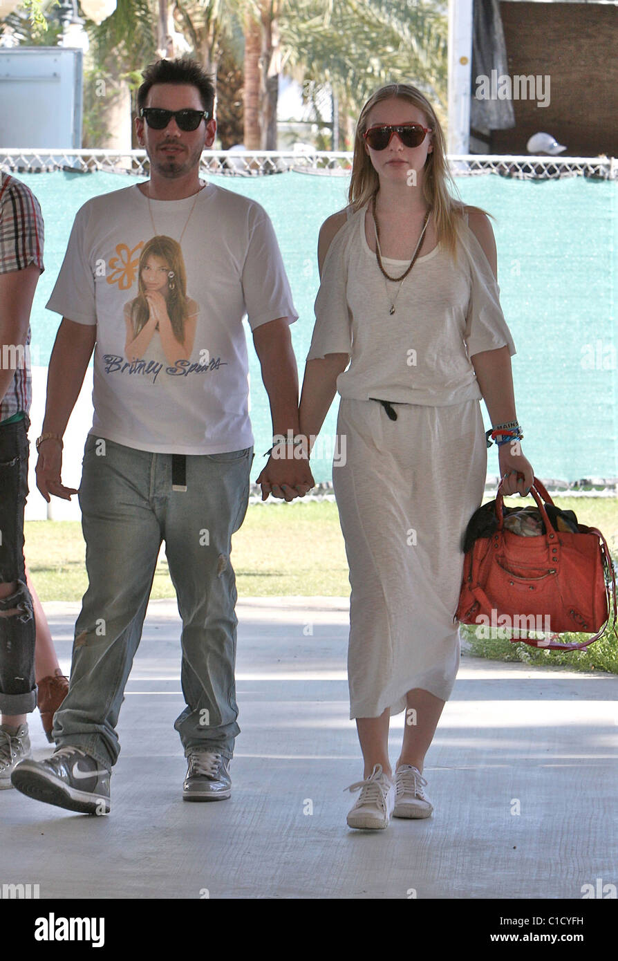 DJ AM aka Adam Goldstein spends time with a female companion at ...