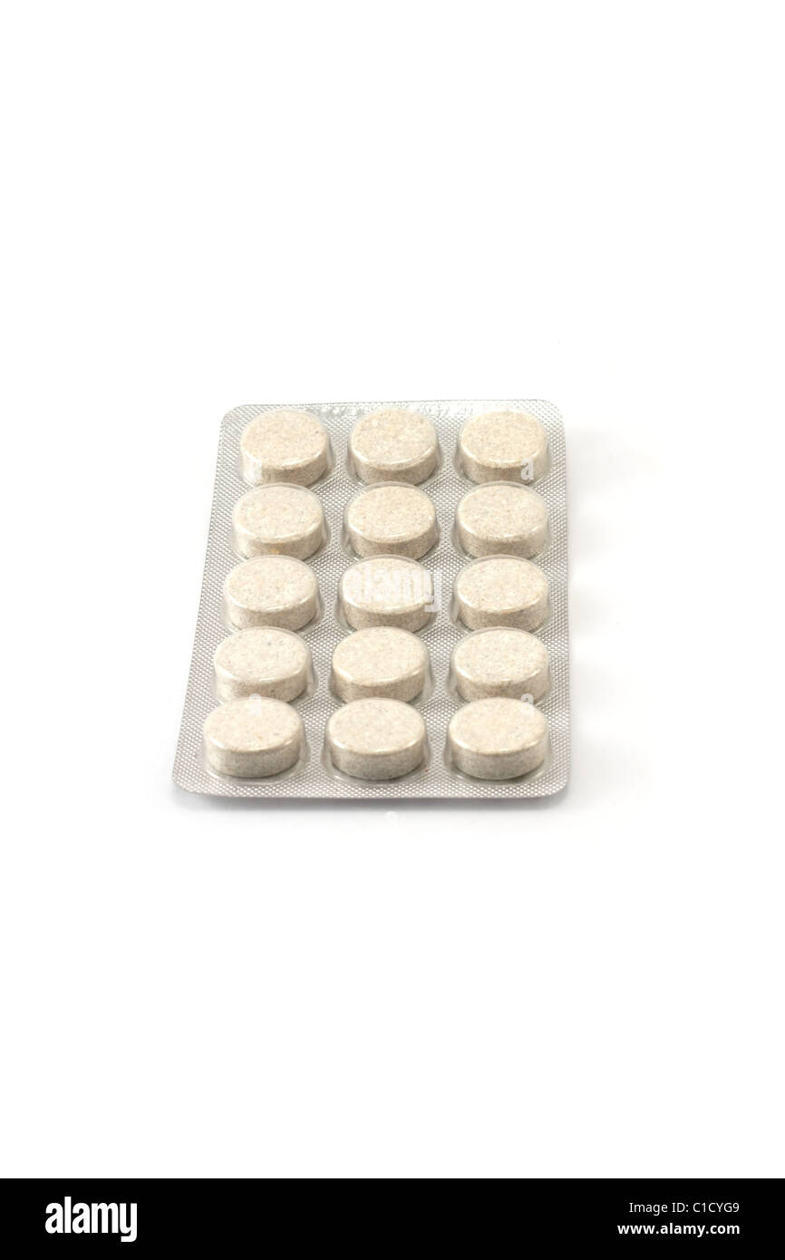 Packing the tablets, insulated on white background Stock Photo - Alamy