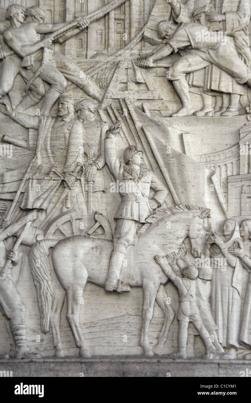 fascist bass relief mural in the EUR district in rome Stock Photo - Alamy