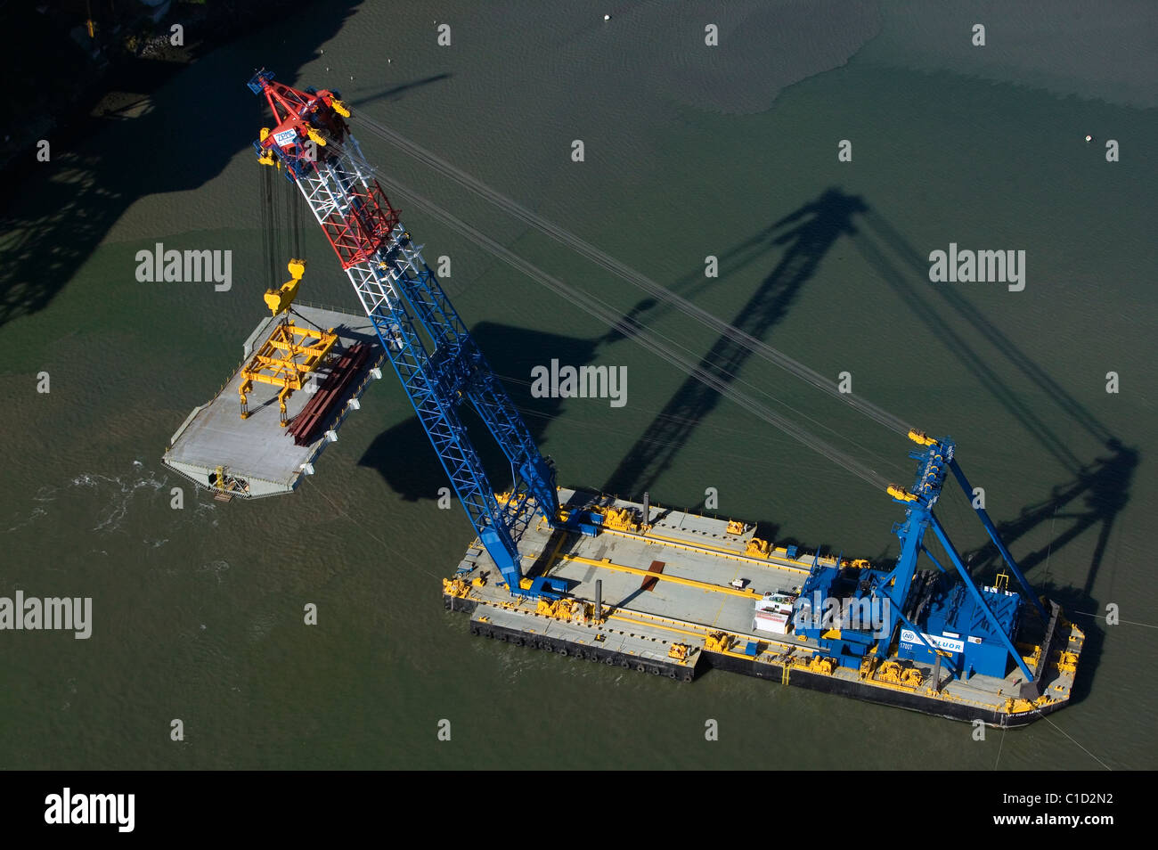 aerial view above Left Coast Lifter floating crane barge lifting ...