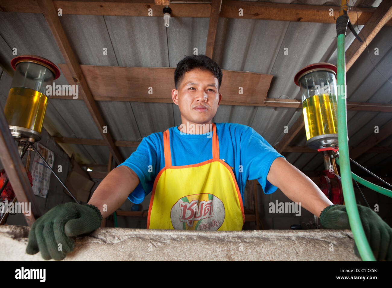 He is owner of petrol station at backwoods village, Mae Ho, Mae Saliang ...