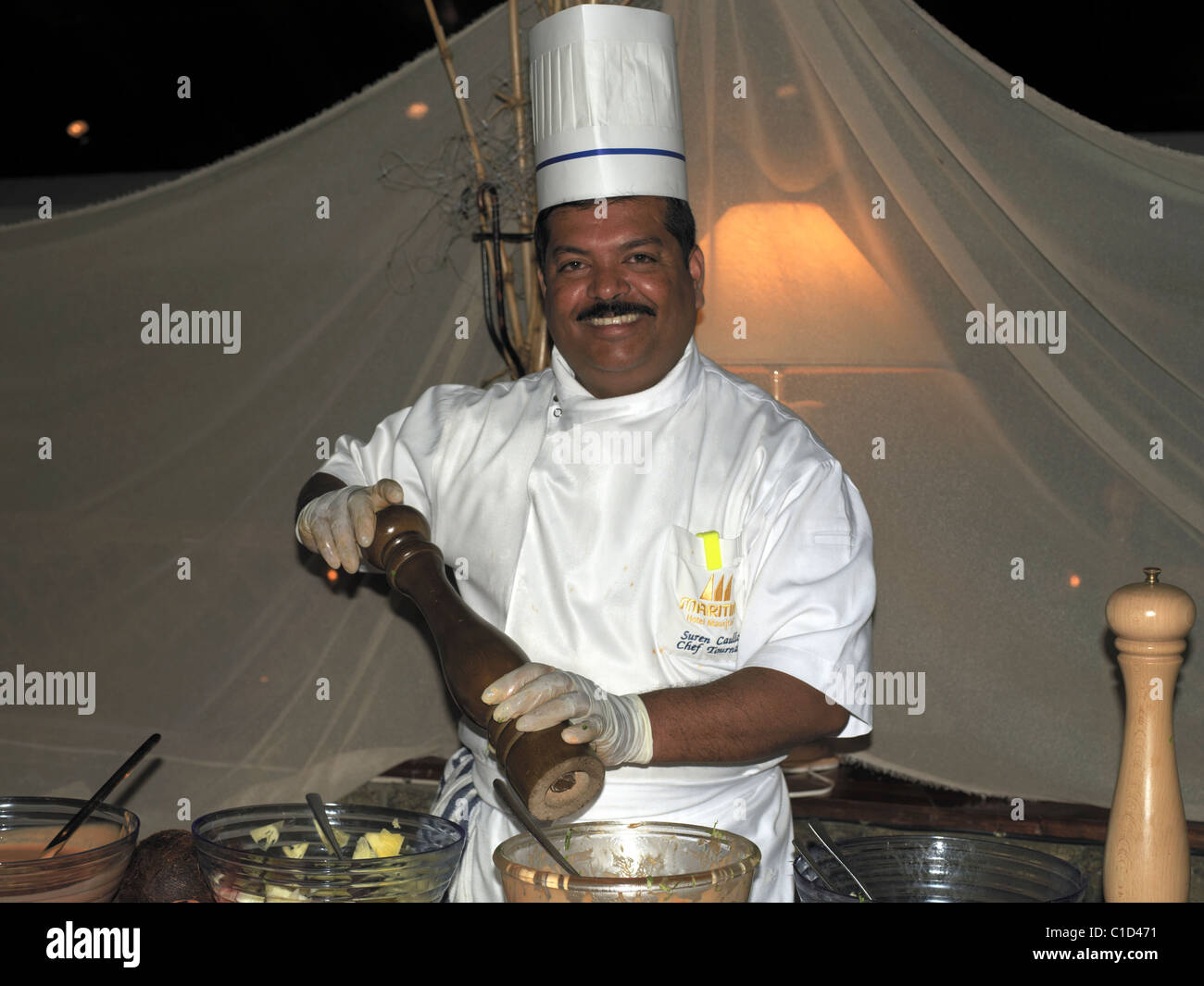 Balaclava Mauritius Maritim Hotel Chef Grinding Pepper Into Food Stock ...