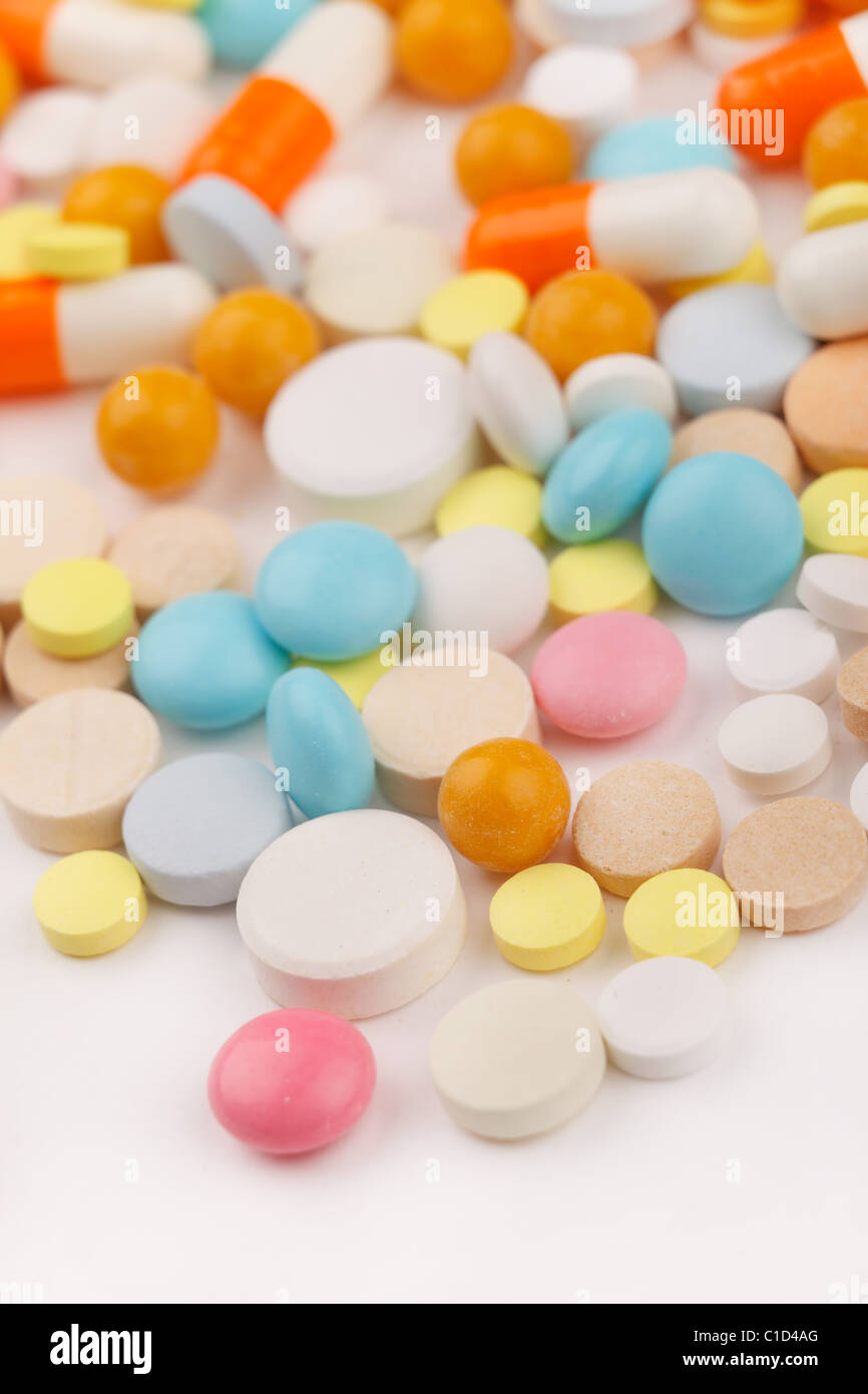 Colorful tablets with capsules Stock Photo - Alamy