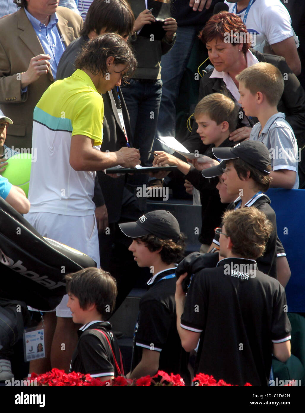 Rafael Nadal sign autographs for Princess Cristina's children Juan and ...