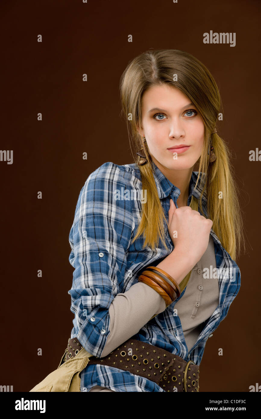 Fashion model - young woman posing in country style clothes Stock Photo ...