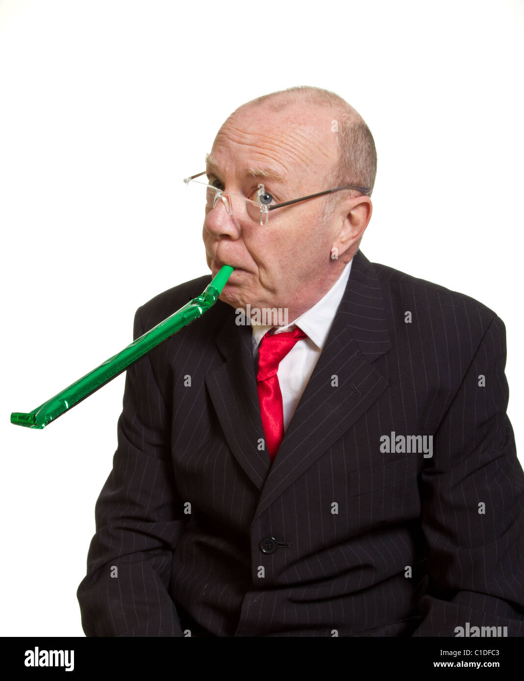 Expressive senior businessman isolated on white party pooper concept ...