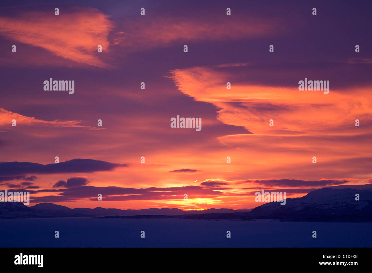 Sun rising over lake tornetrask hi-res stock photography and images - Alamy