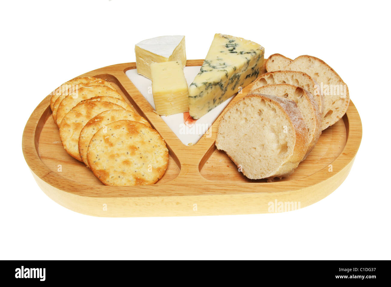 Cheese board with biscuits and bread isolated against white Stock Photo ...
