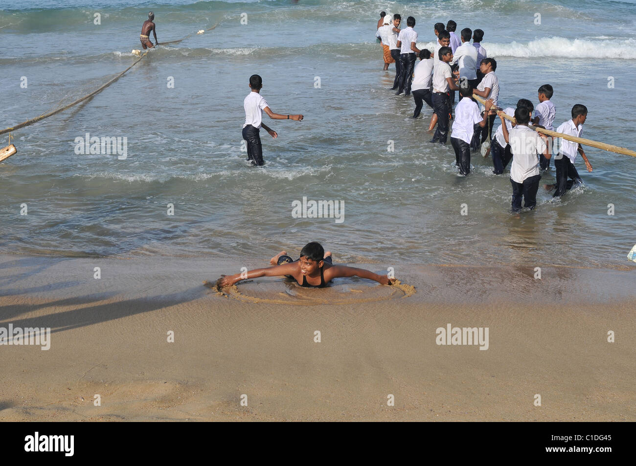 boy swimming at the beach Stock Photo - Alamy