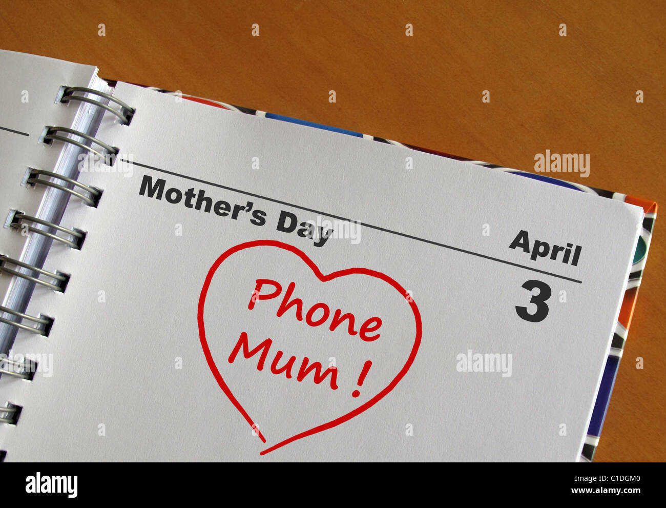 Mother's Day calendar with a red heart and reminder "phone Mum" in red ...