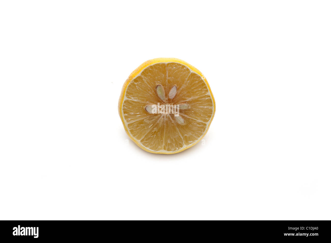 Half of the lemon, cut dry on white background Stock Photo - Alamy