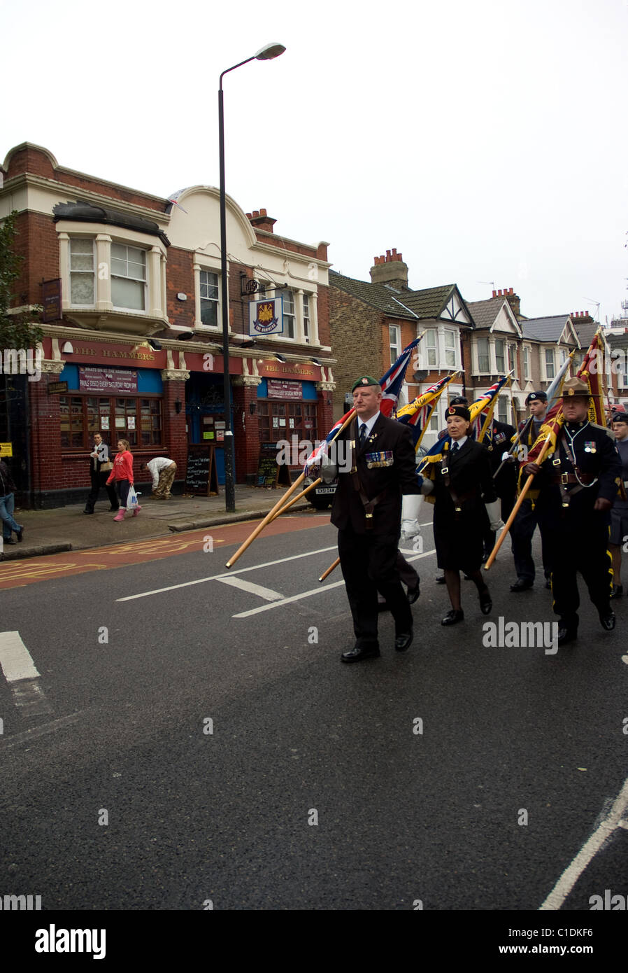 remembrance day parade passing the Hammers public house high st south ...
