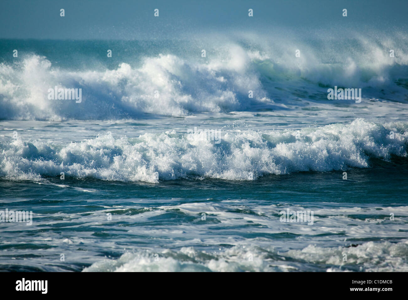 Waves breaking on the Beach Stock Photo - Alamy