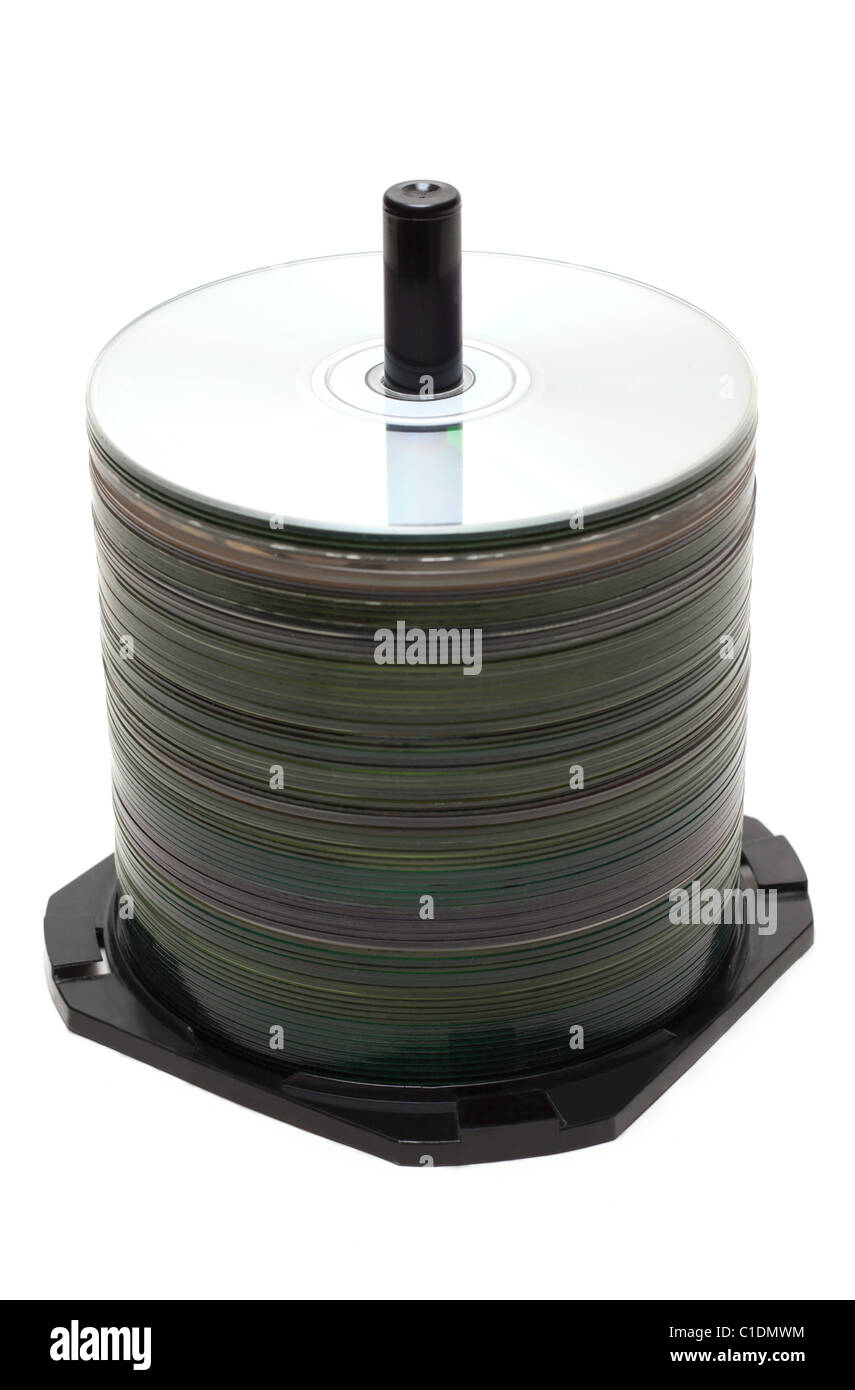 Pile CD disk on spindel insulated on white background Stock Photo - Alamy