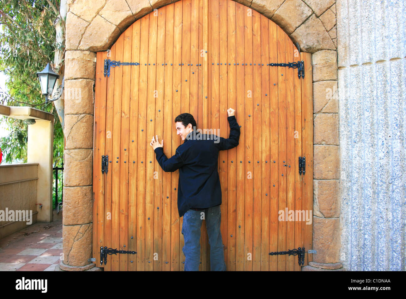 Boy knocking door hi-res stock photography and images - Alamy