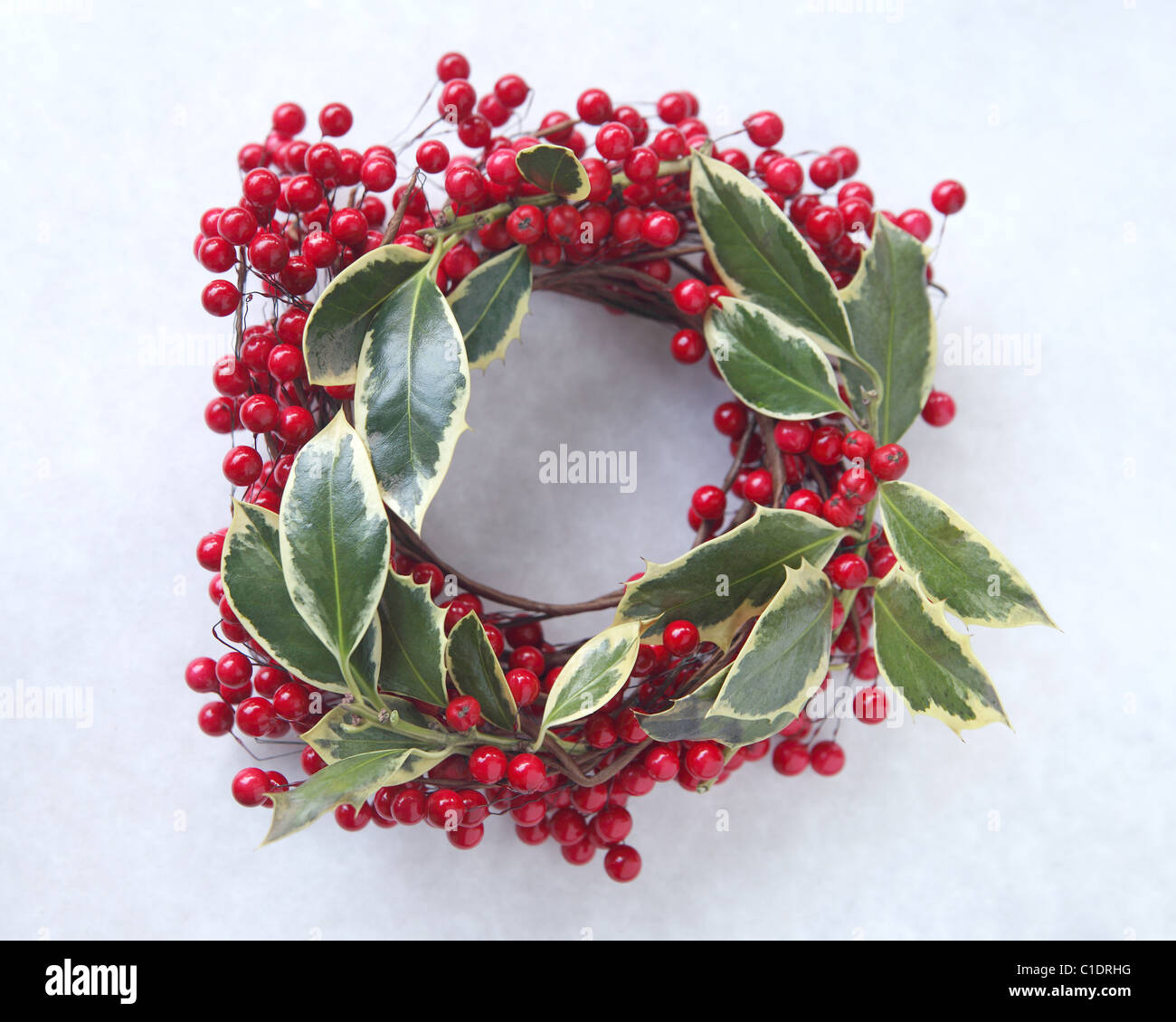 holiday decoration with fresh holly leaves Stock Photo - Alamy