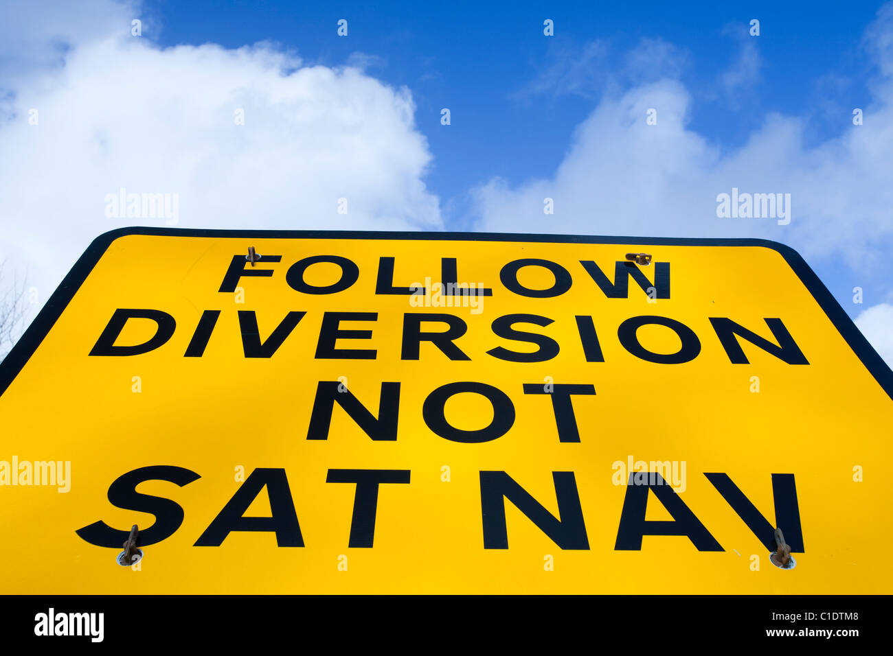 A road sign for a diversion round roadworks in Ambleside, Cumbria, UK ...