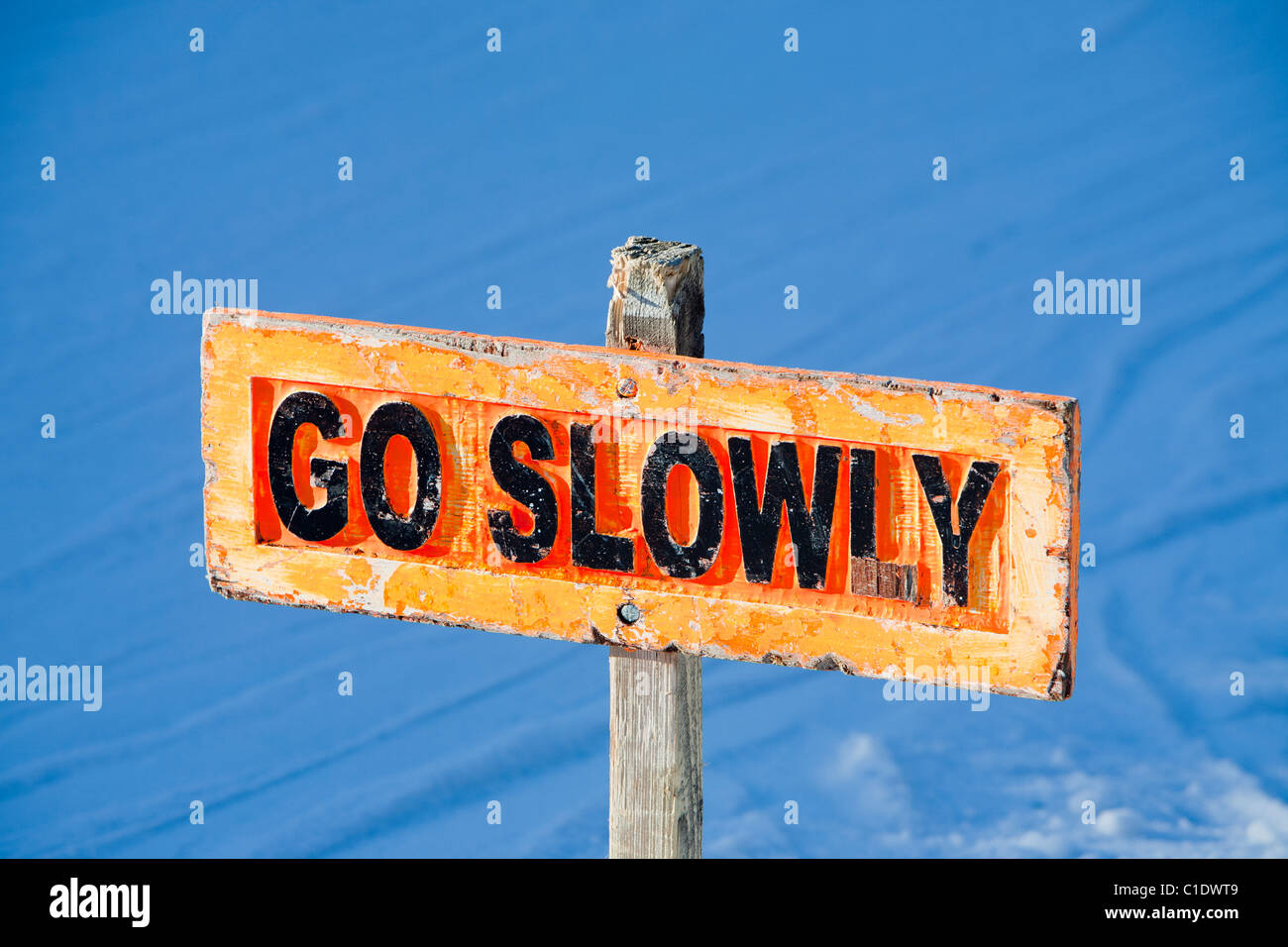 Slow down ski sign hi-res stock photography and images - Alamy