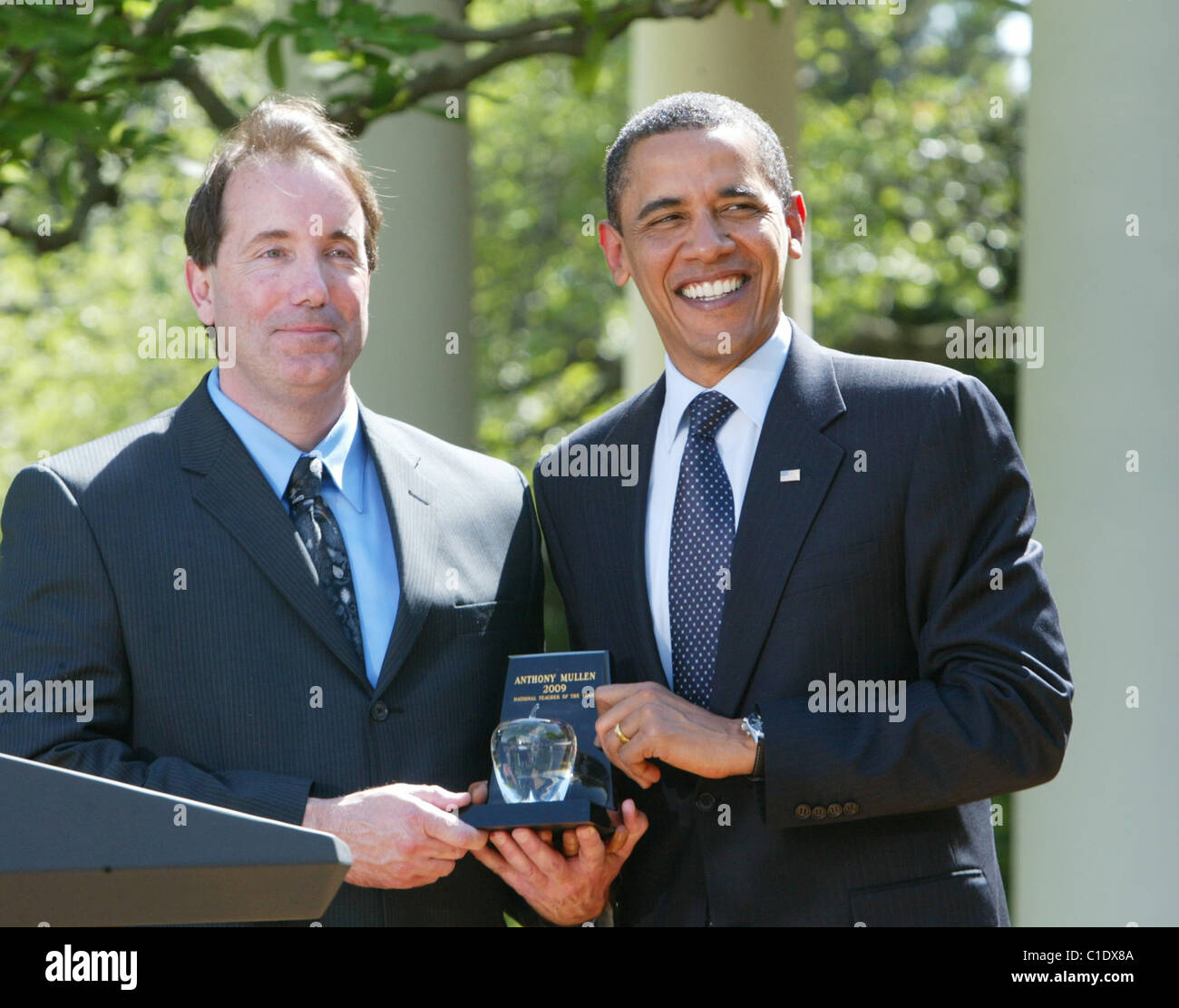 Teacher Anthony Mullen of Greenwich, Connecticut. receives the award ...