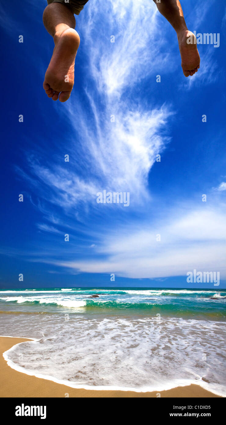 Summer cloud and jump to sea from the beach Stock Photo - Alamy