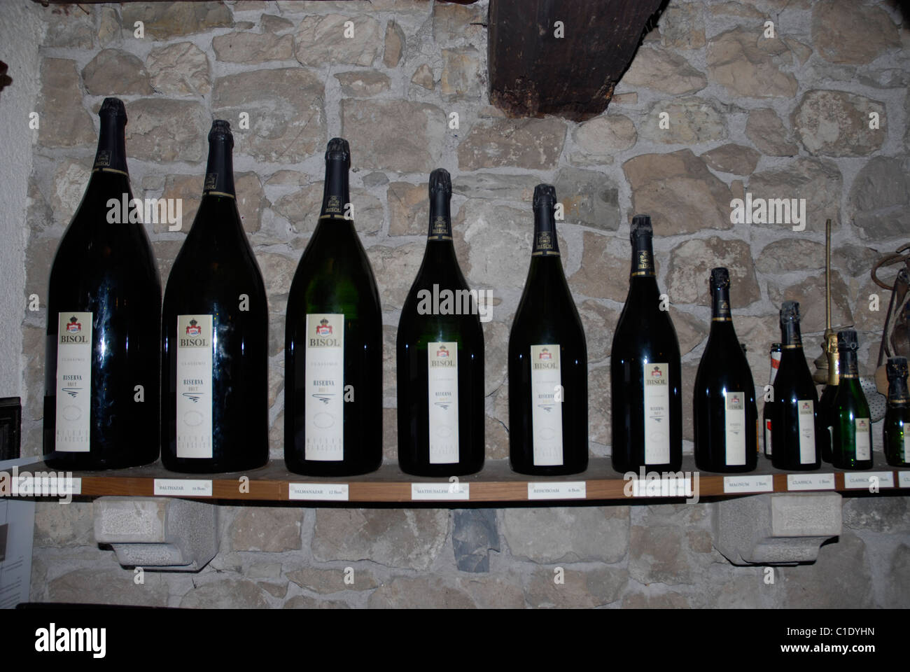 line of bottles in a wine cellar Stock Photo - Alamy
