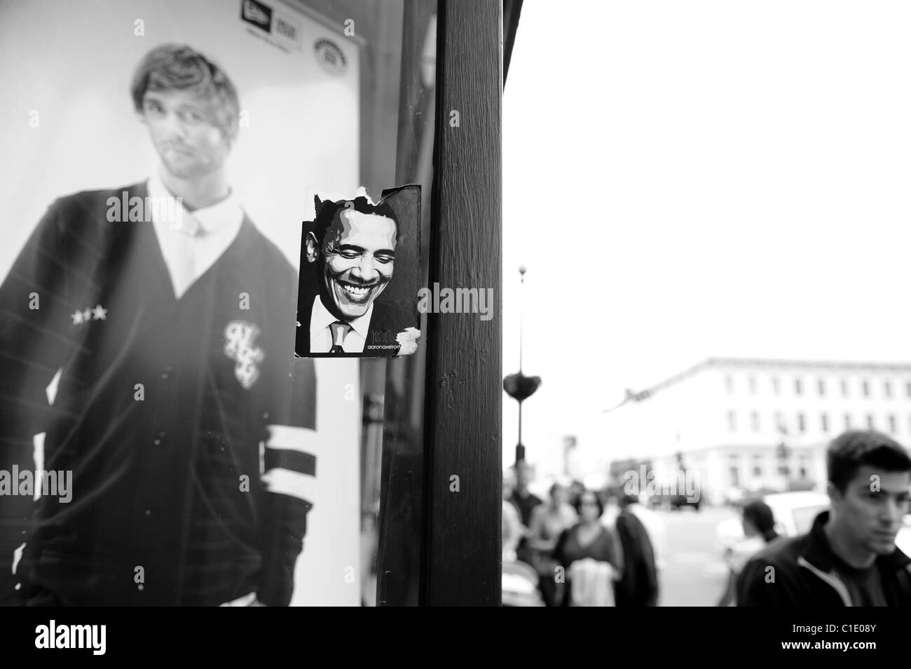 A sticker of U.S. President Barack Obama is seen on a boutique's window ...