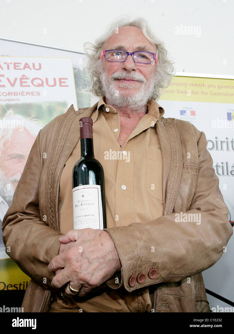 French actor and wine grower Pierre Richard signs bottles of his own ...