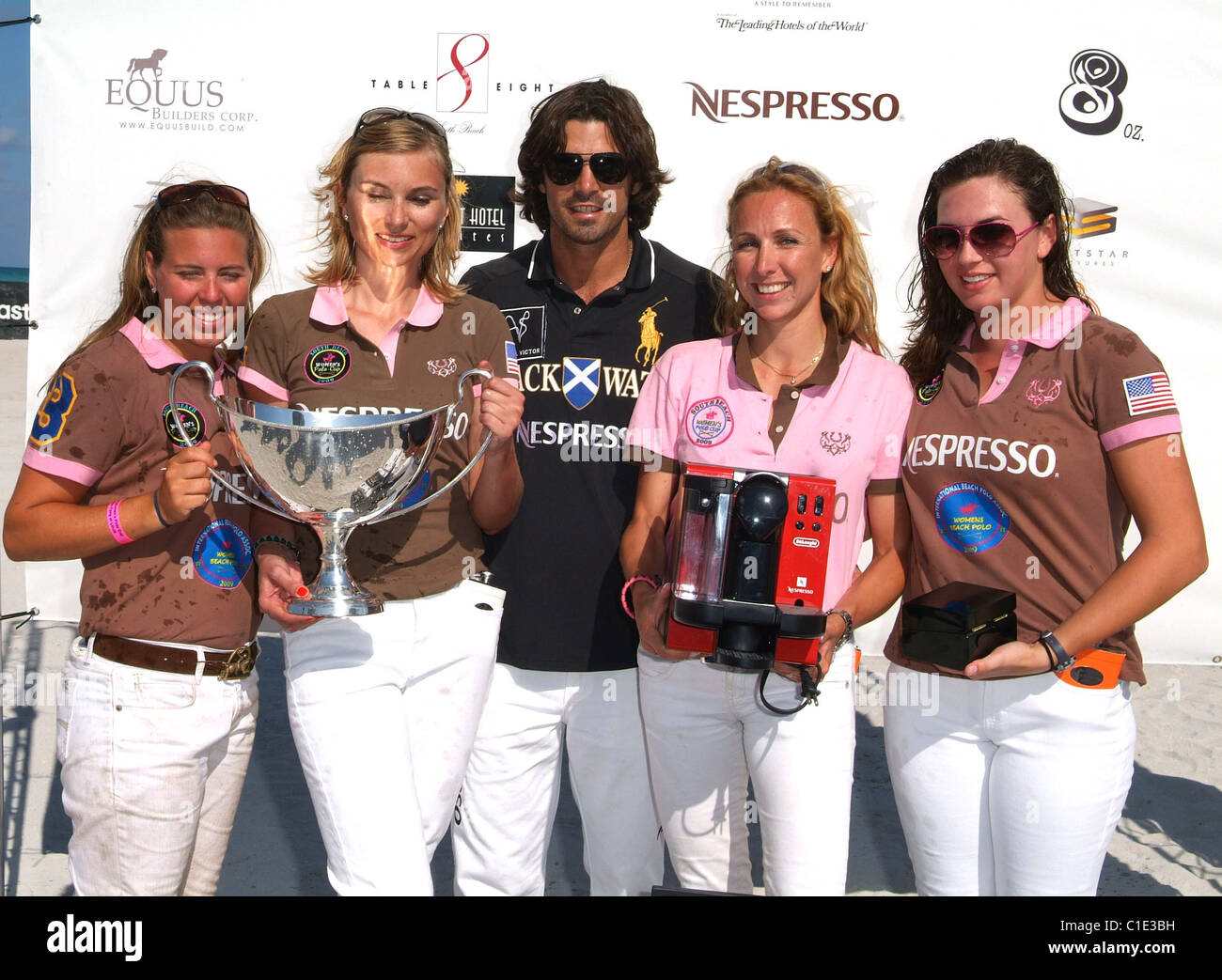 Nespresso women Teams and Nacho Fiqueras (center) at the 5th Annual ...