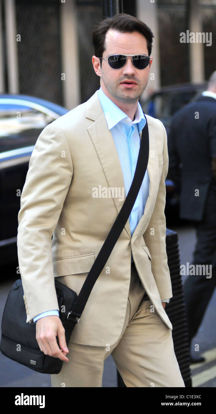 Funnyman Jimmy Carr leaving the Ivy Restaurant, wearing a beige suit ...
