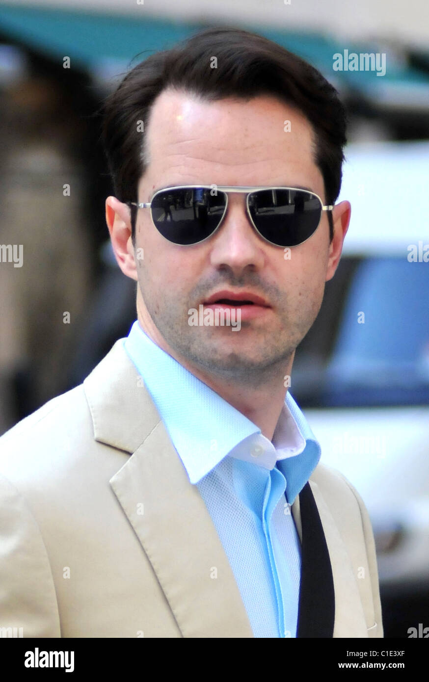 Funnyman Jimmy Carr leaving the Ivy Restaurant, wearing a beige suit ...