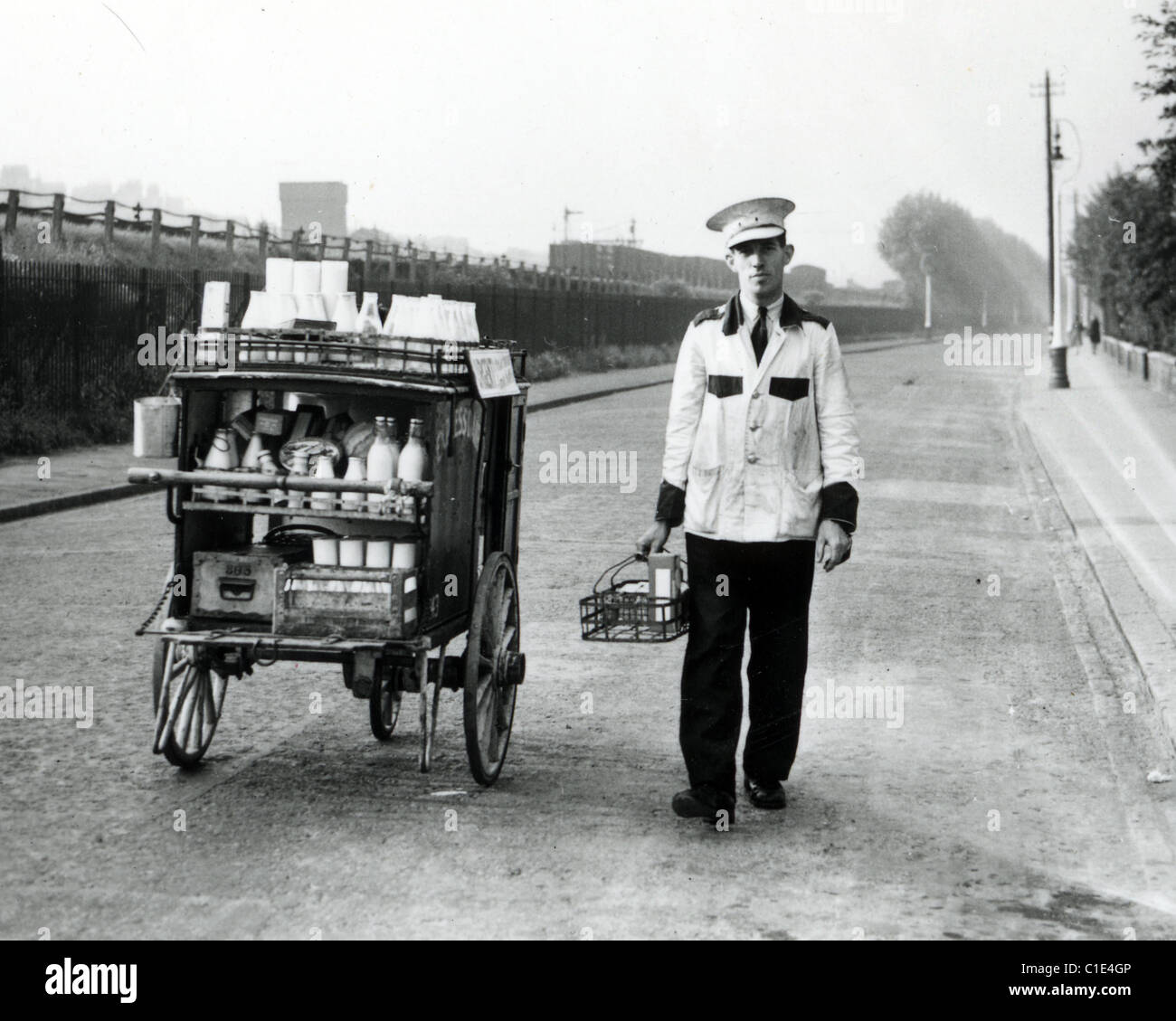 MILKMAN making his rounds in south London, September, 1940 Stock Photo ...