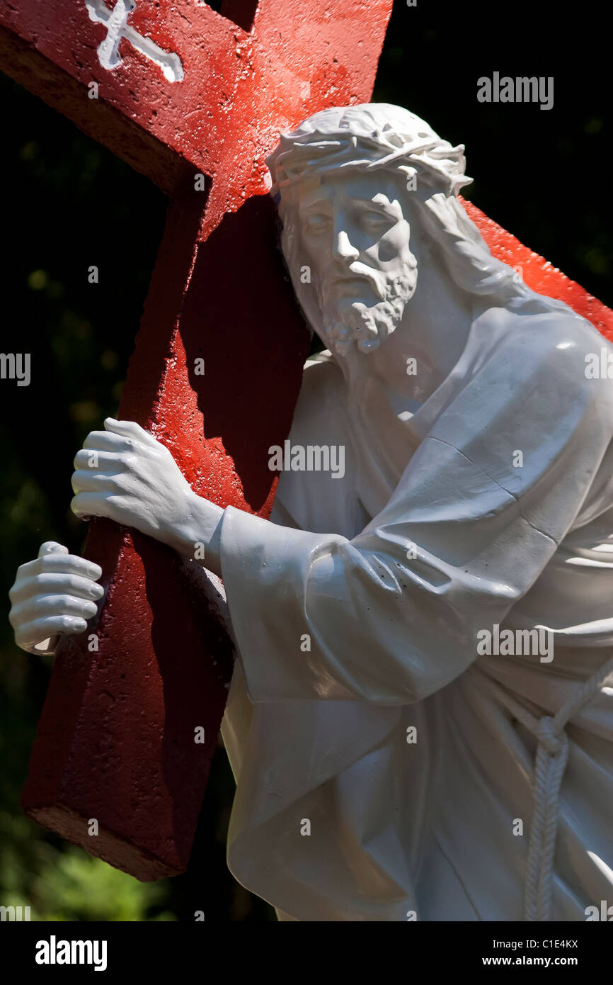 Stone cross christ figure hi-res stock photography and images - Alamy