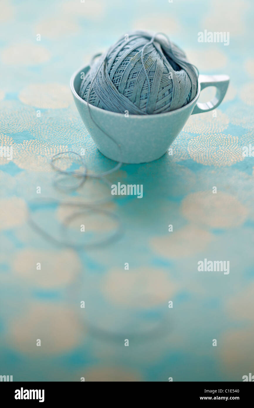pale blue mel mac vintage coffee cup with ball of string Stock Photo ...