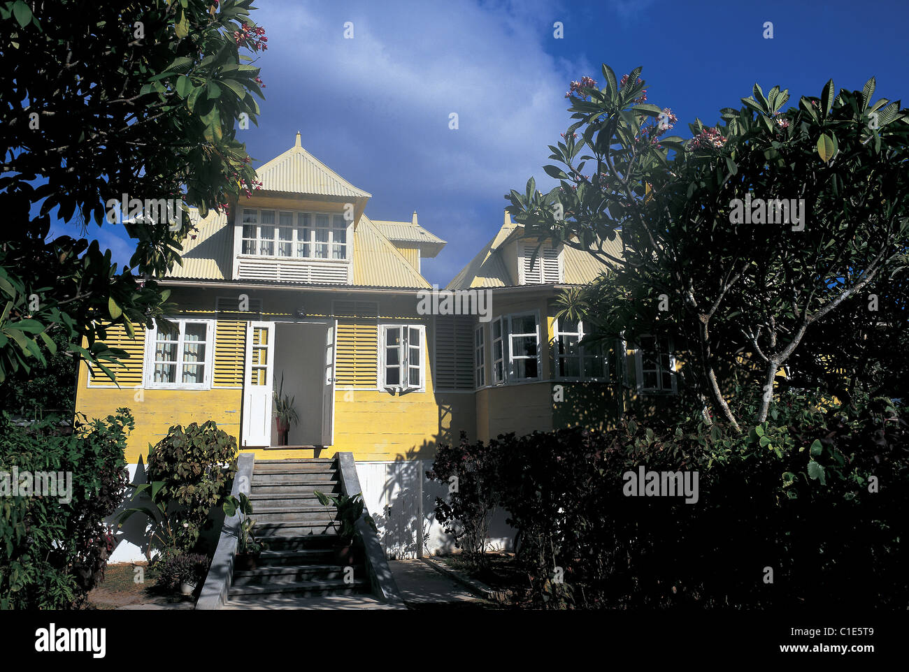 Seychelles, Island of the Dike, the yellow colonial style house Stock ...