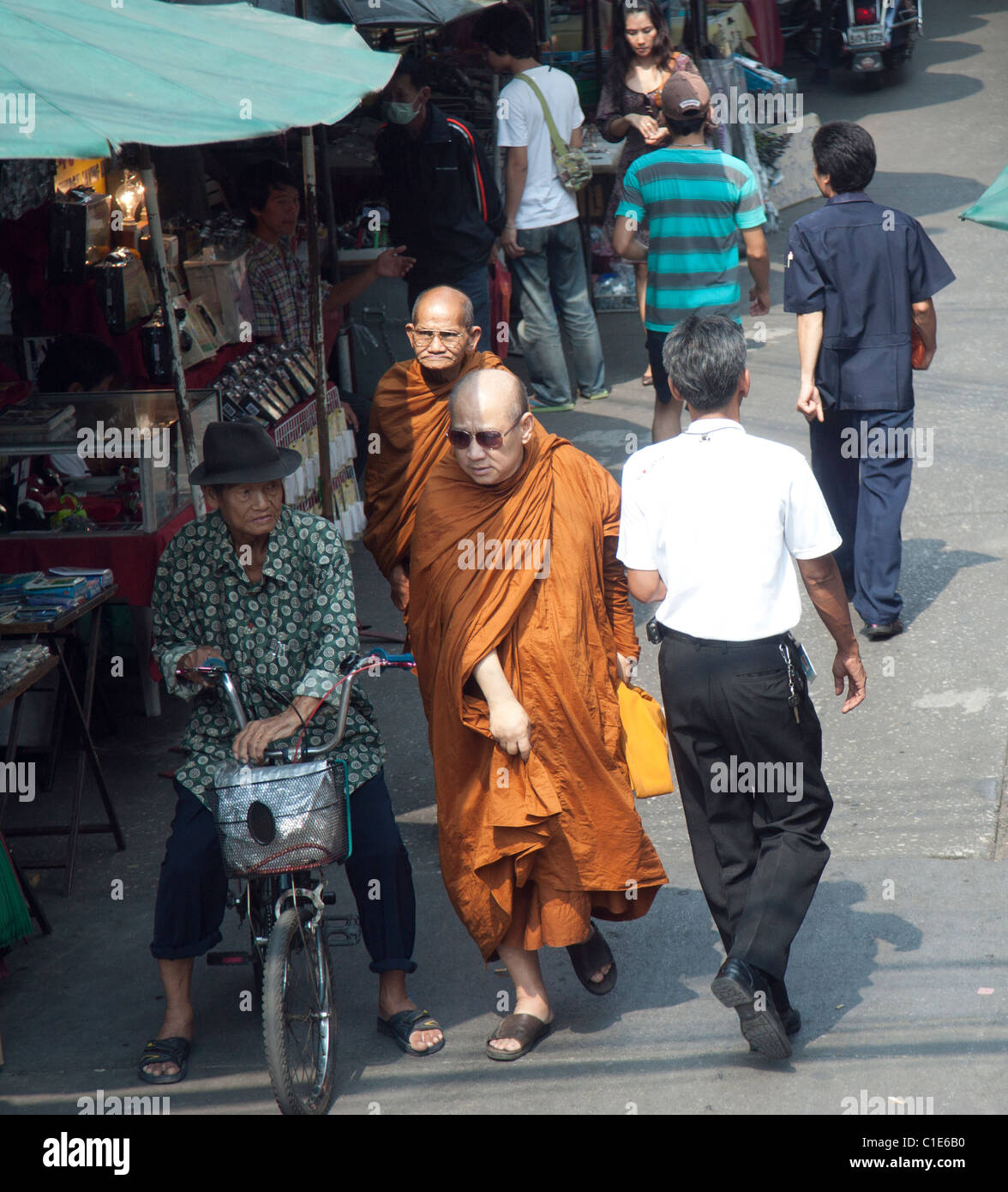 Buddhist Monks on the Street in Bangkok Stock Photo - Alamy