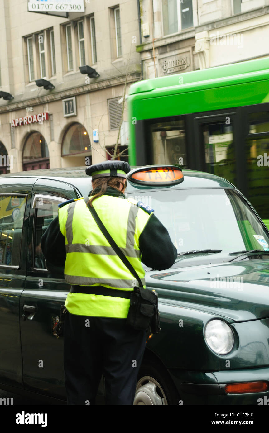 Taxi With Parking Ticket Stock Photo - Alamy