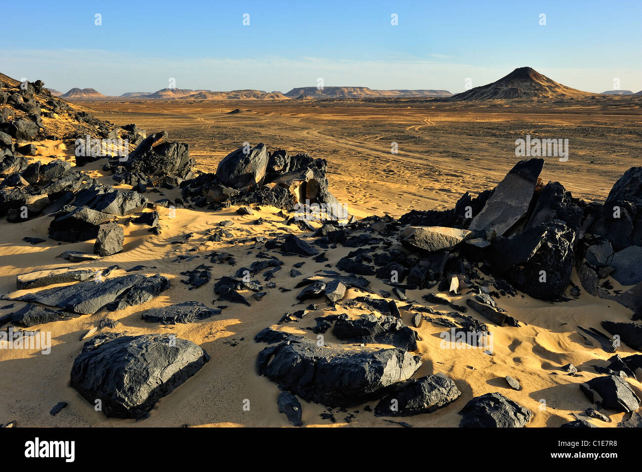 Mountain of volcanic origin in the Black Desert, Lybian Desert, western ...