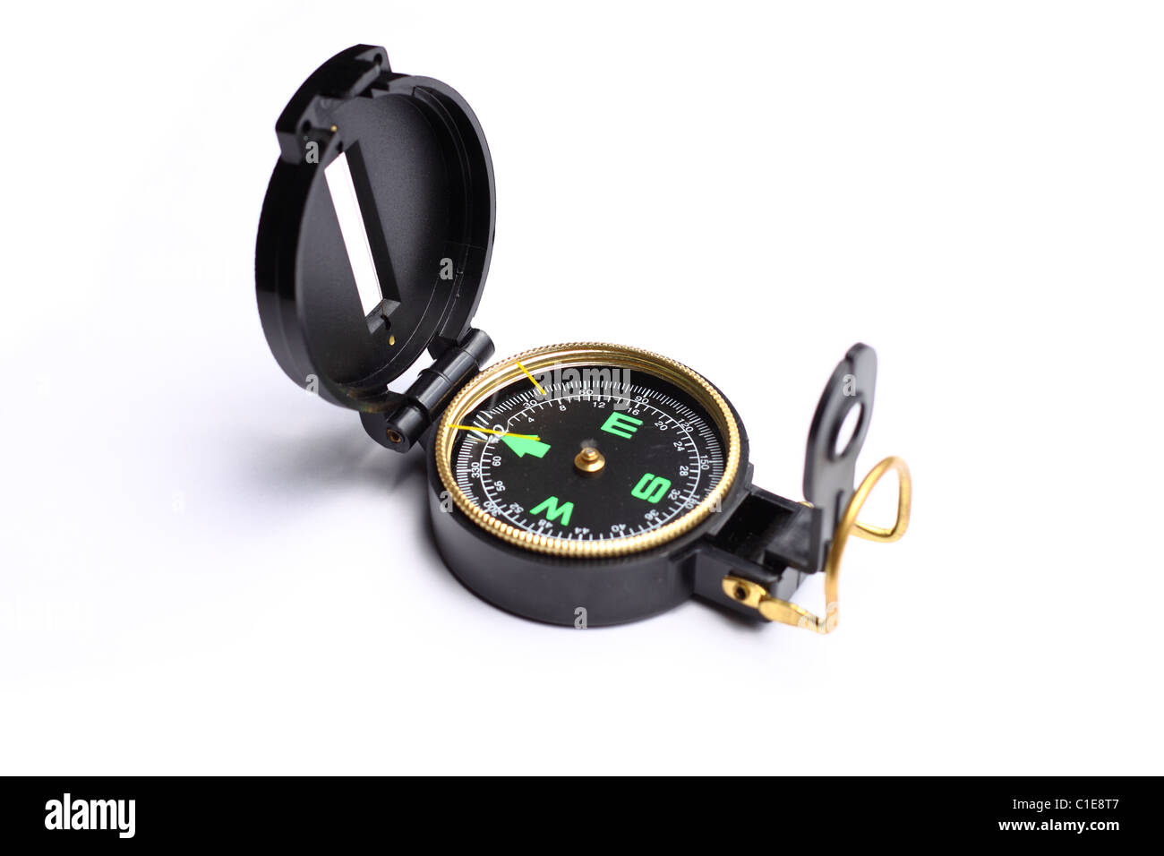 Black and gold plastic compass on white background Stock Photo - Alamy