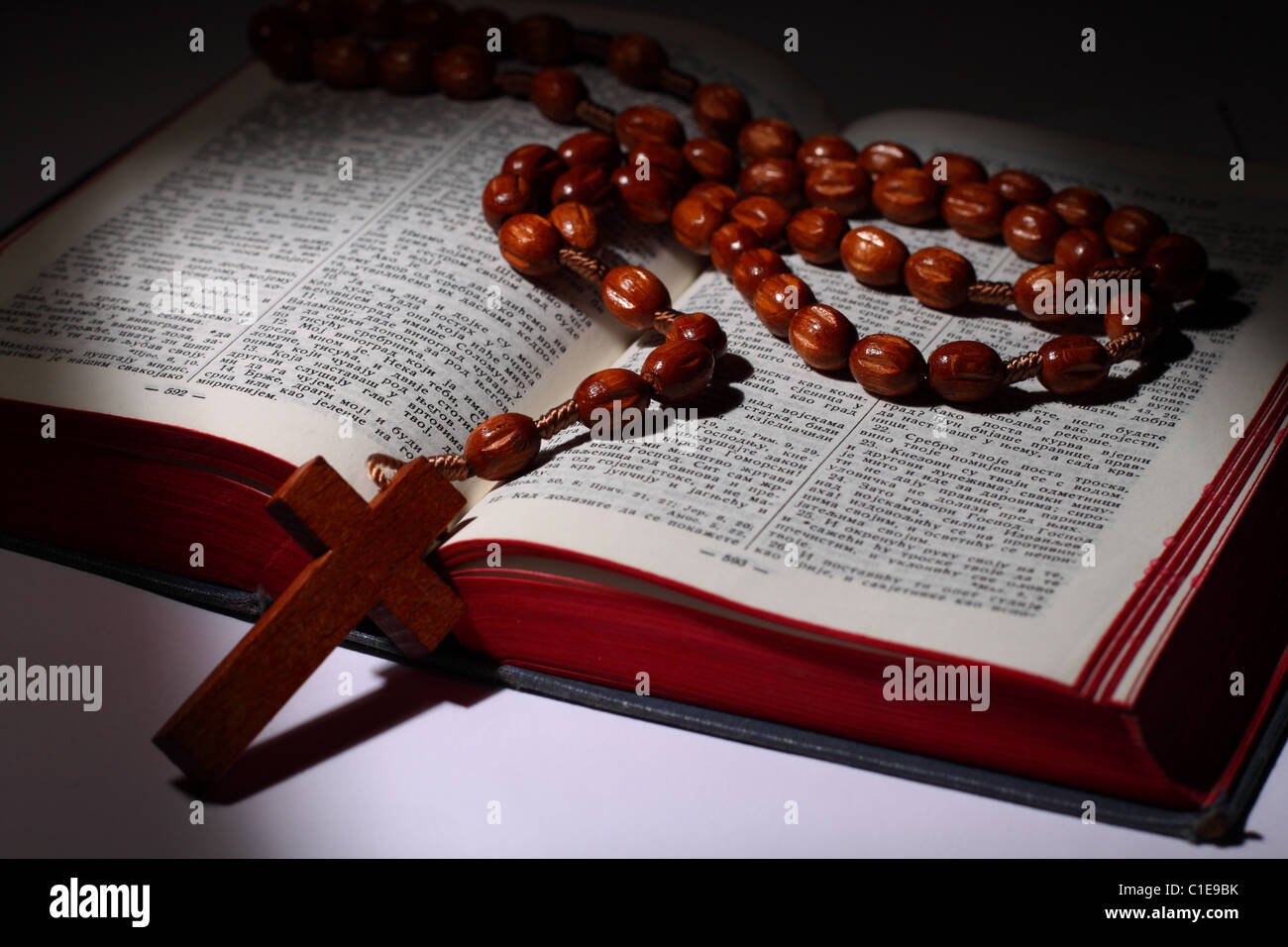 Bible written in Cyrillic letters with Christian rosary and cross Stock ...