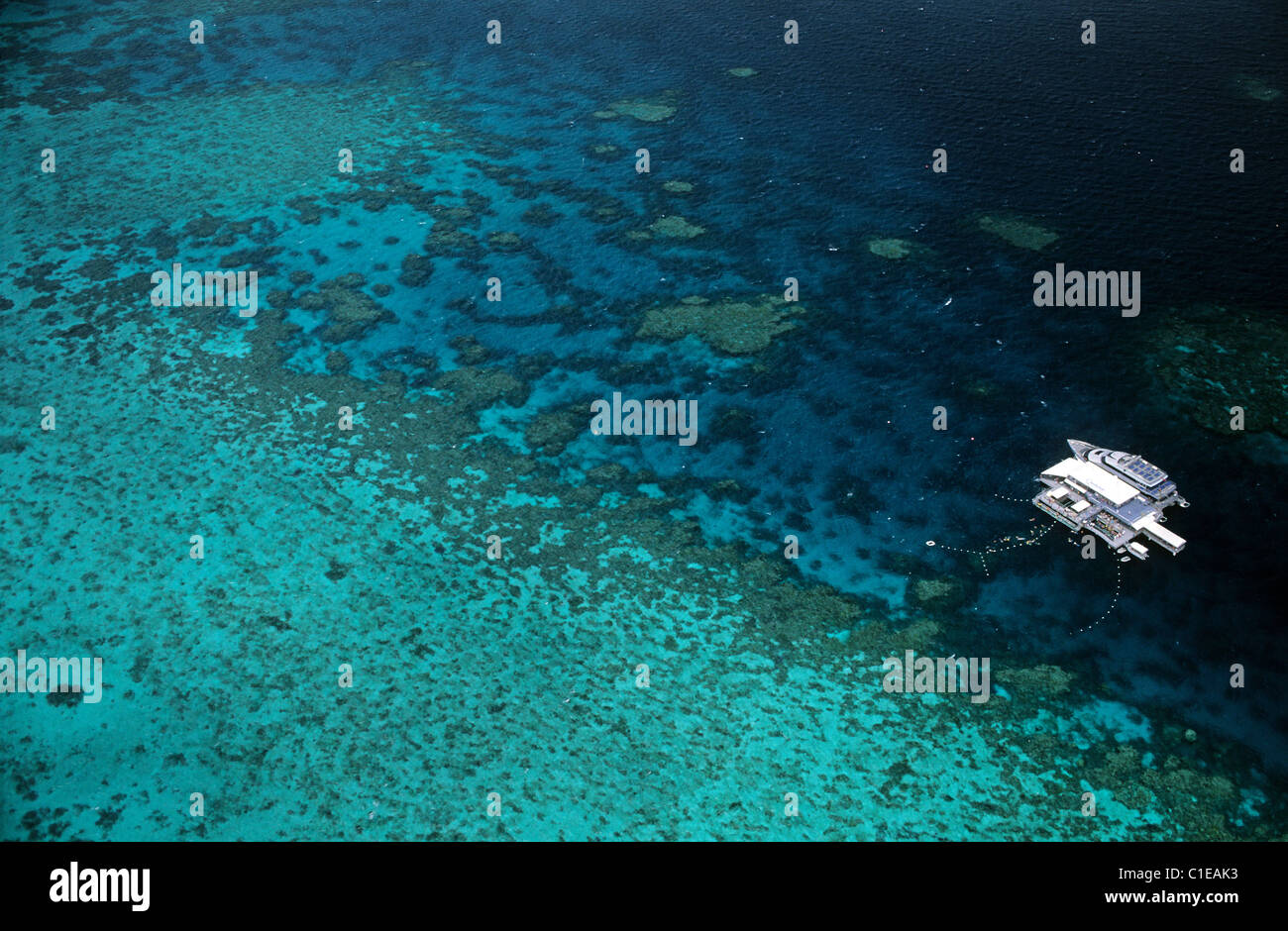 Australia, Queensland, Boat and Pier on the Great Barrier Reef (Aerial ...