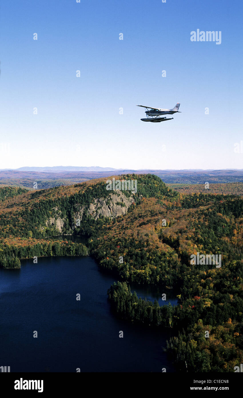 Canada, Quebec Province, hydroplane flying over the Park of Gatineau in ...