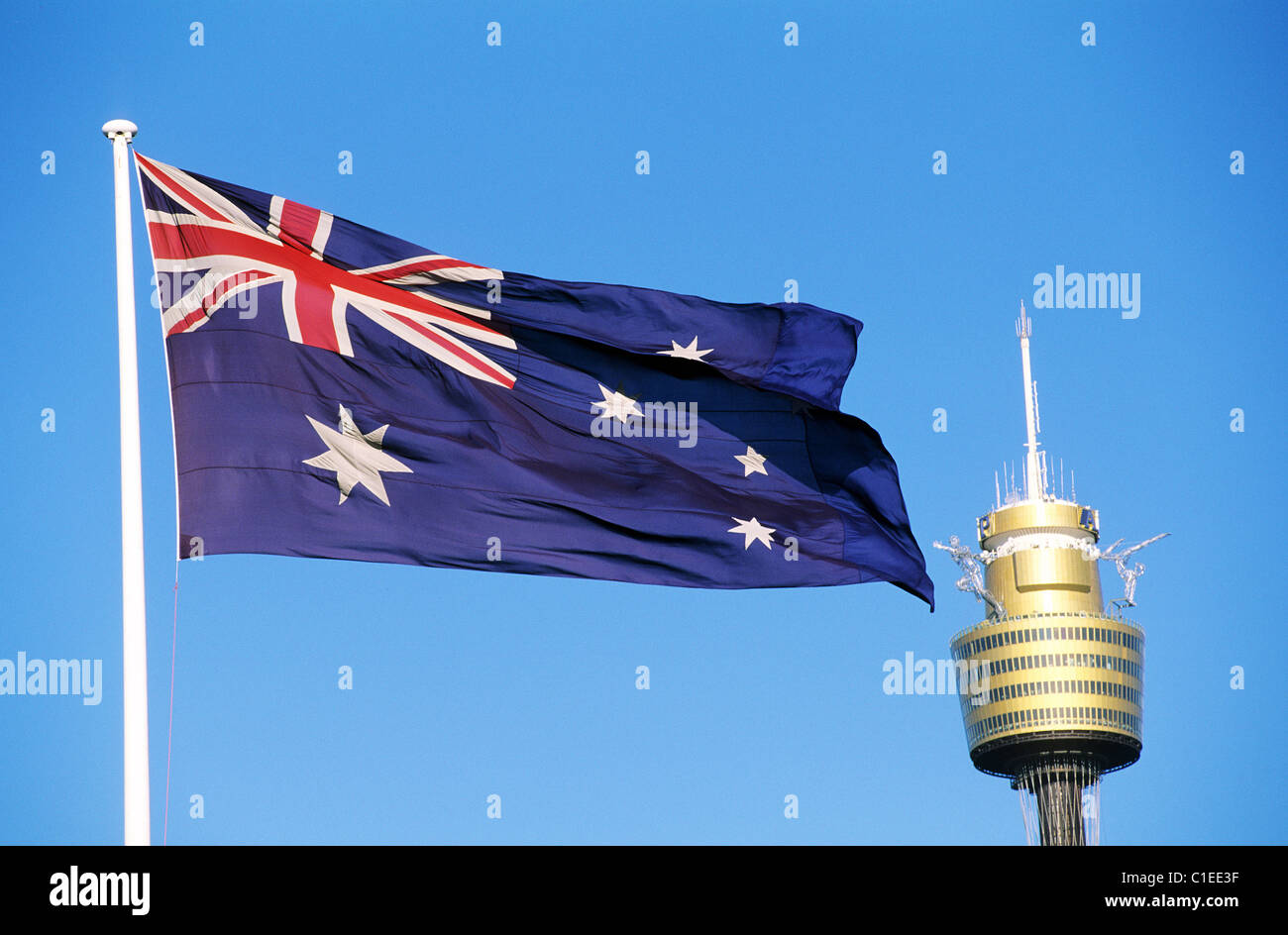 Australia, Sydney, Australian Flag in Darling Harbour and the AMP Tower ...