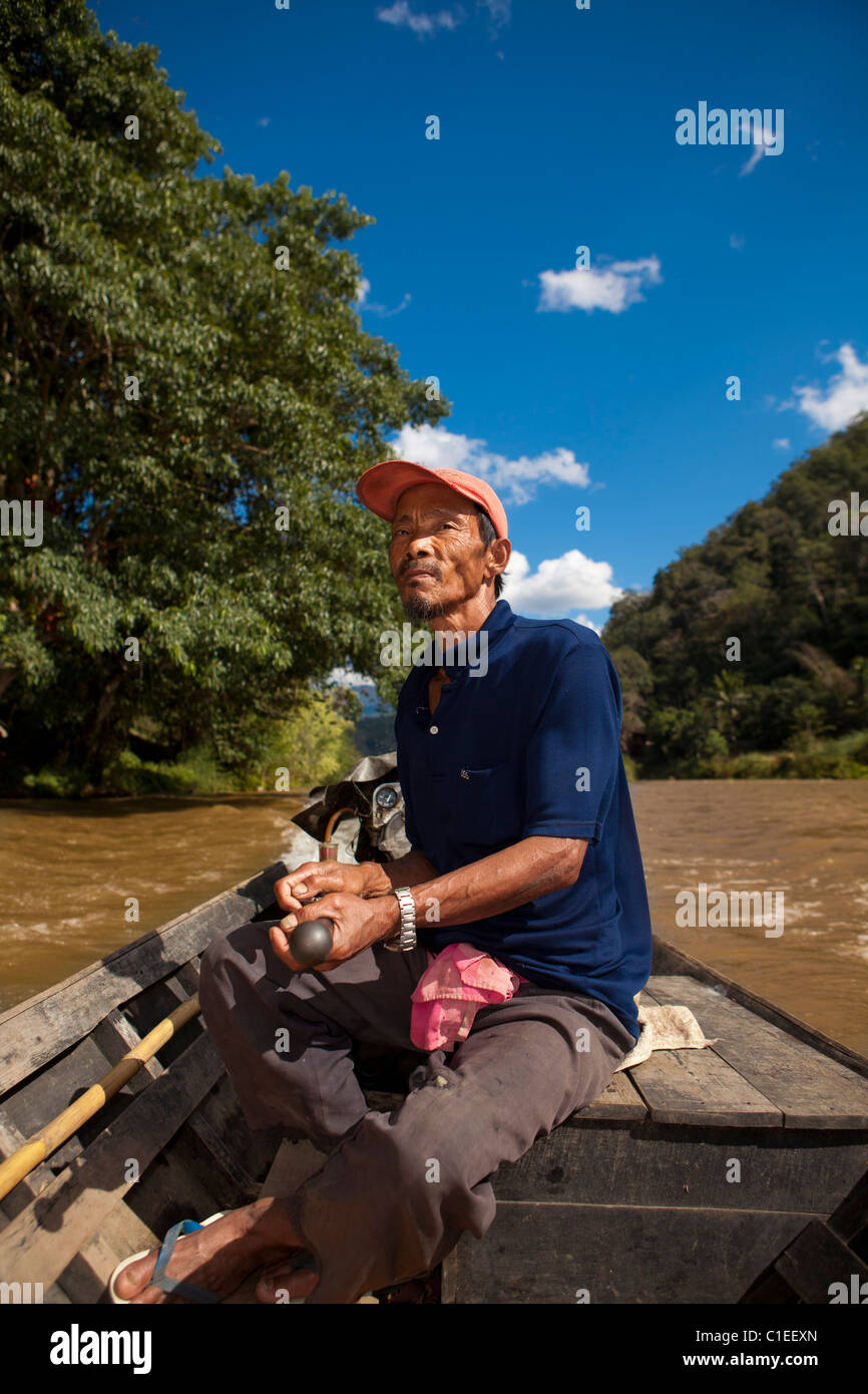 Boat man drive the boat to Karen long neck refugee village at river pai ...