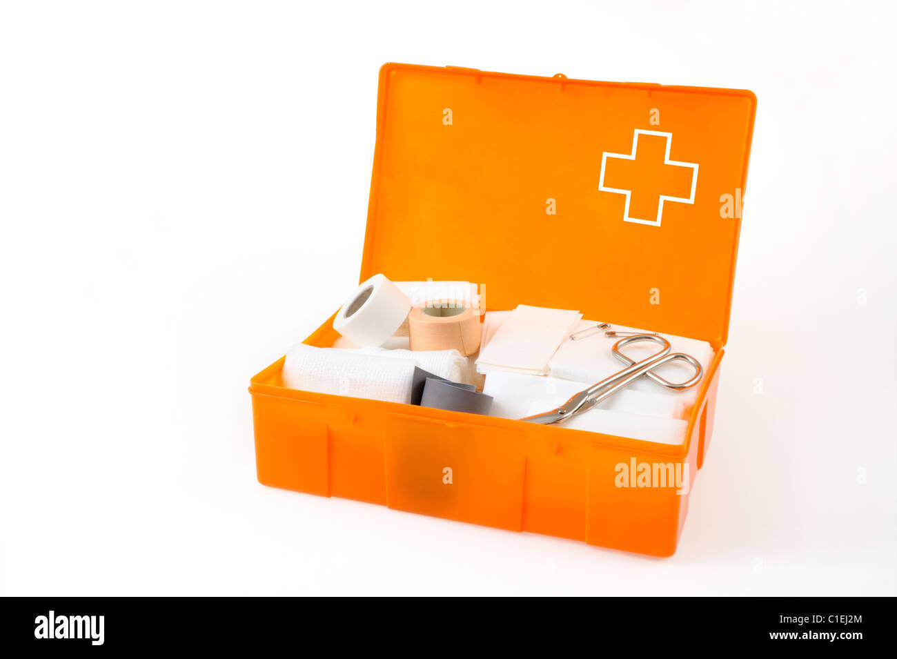 Detail of open first aid kit isolated on white background - emergency ...
